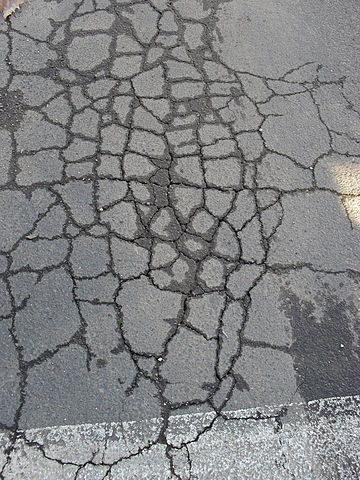 How To Fix Crumbling Asphalt Driveway - Stuck Arch